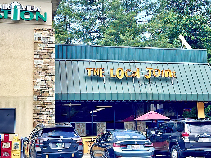 The Local Joint's exterior welcomes you with cheerful yellow accents and colorful umbrellas &ndash; like a culinary lighthouse beckoning hungry travelers to safe harbor.