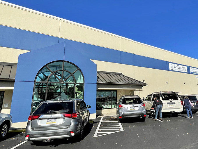 The distinctive blue and cream exterior of Re-Uzit Shop beckons like a retail oasis in New Holland, where second chances and first-rate finds await.