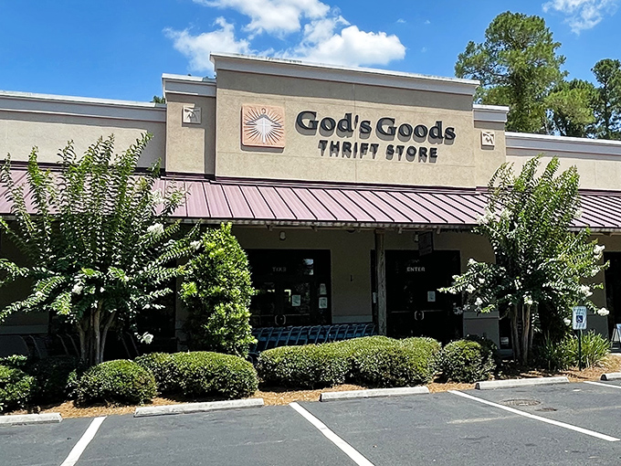 The welcoming facade of God's Goods Thrift Store stands proud under South Carolina's blue skies, promising treasures within its walls