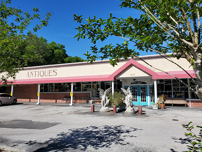 The iconic pink awning and angel statues of Village Antique Mall welcome treasure hunters like old friends. Florida sunshine makes this Mt. Dora landmark practically glow with possibility.