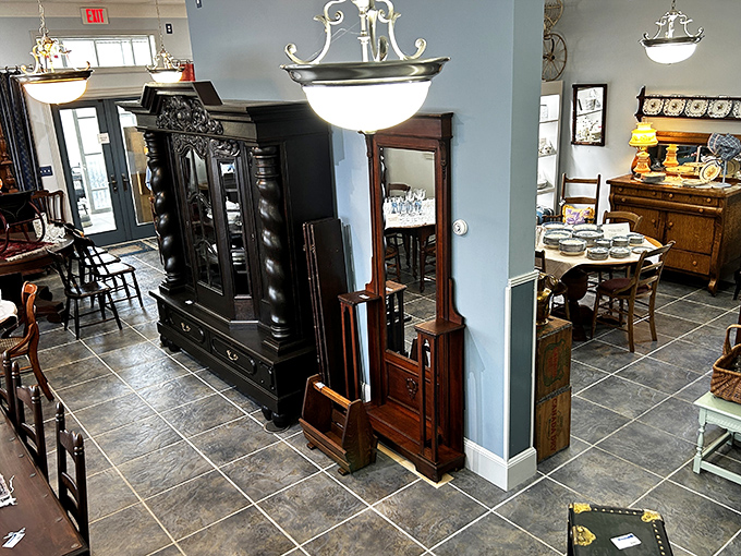Victorian elegance meets meticulous organization in this showroom. That ornate black cabinet could have starred in "Downton Abbey" as the keeper of family secrets.