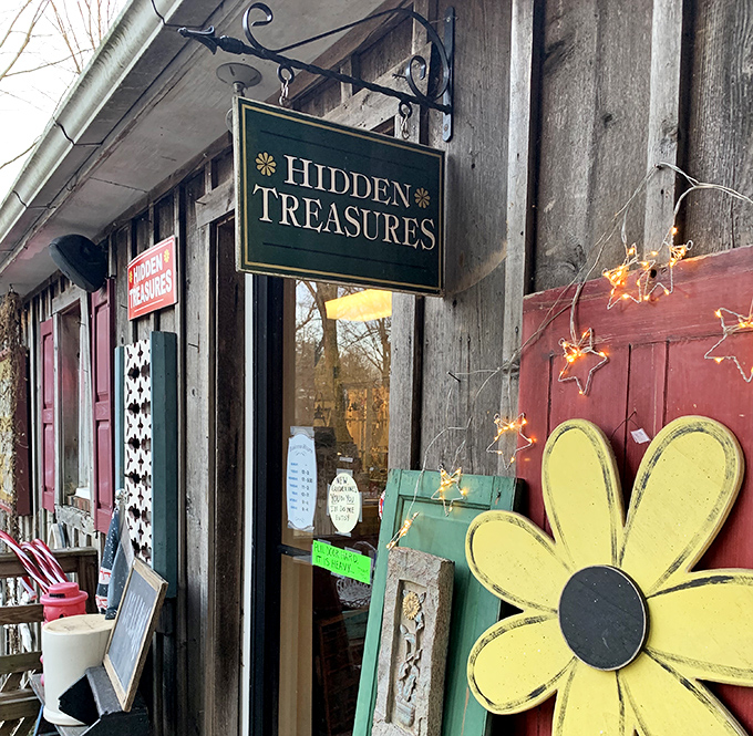 The weathered exterior promises adventures inside, where decades of treasures wait behind that perfectly vintage green sign.