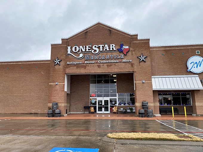 The brick facade of Lone Star Mercantile stands like a temple to Texas treasures, complete with iconic stars flanking the entrance&mdash;vintage hunting paradise awaits inside.