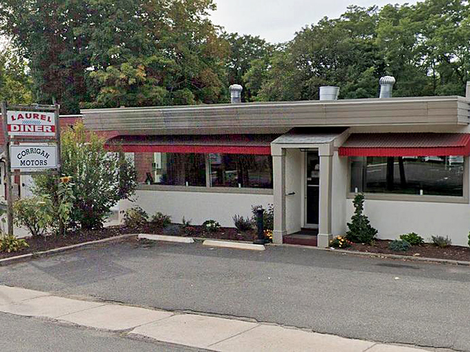 The classic red awnings of Laurel Diner beckon hungry travelers like a lighthouse for breakfast enthusiasts navigating the streets of Southbury.