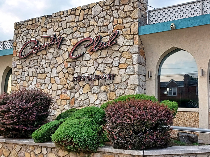 That iconic stone exterior with its vintage signage promises comfort food treasures within. No Instagram filter needed here.