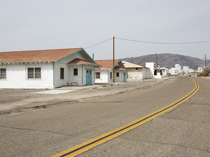 Desert living at its most authentic&mdash;modest homes stand sentinel against the dramatic backdrop of mountains that frame this resilient mining community.