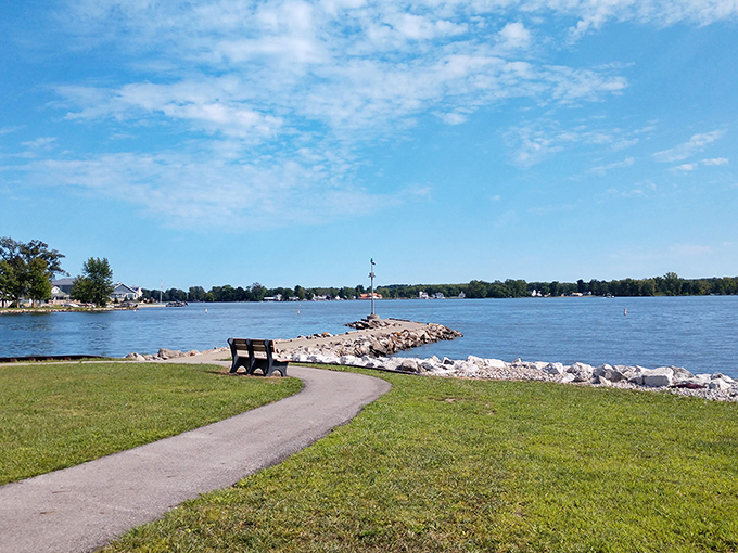 Nature's front-row seat: A simple bench offering million-dollar views of Buckeye Lake's shimmering waters and endless sky.