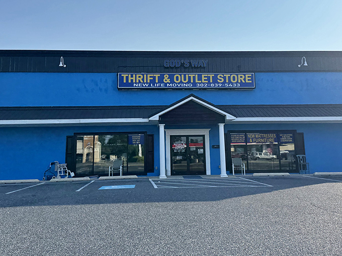 The unmistakable blue facade of God's Way Thrift Store stands out like a beacon of bargain-hunting possibilities on Coastal Highway.