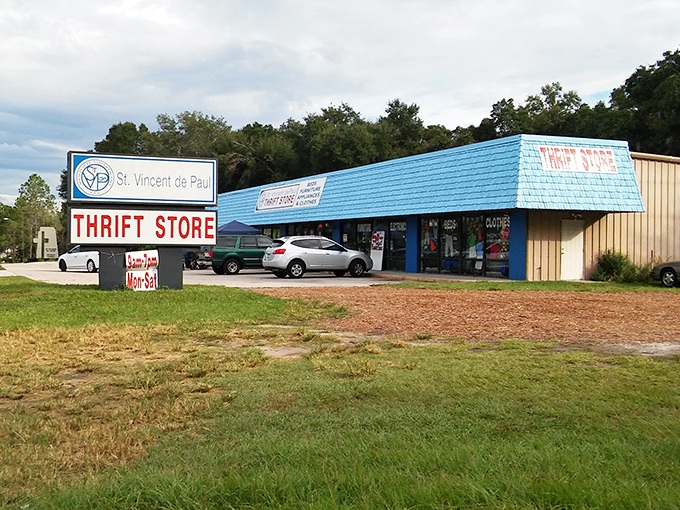 The bright blue awning of St. Vincent de Paul beckons like a thrift oasis in Apopka, promising treasures that won't break your vacation budget.