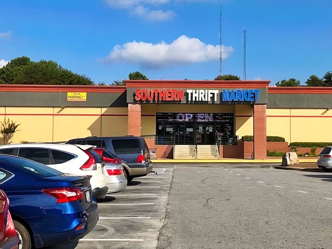 The red, white, and blue sign beckons like a patriotic promise of bargains within. This unassuming storefront holds treasures waiting to be discovered.