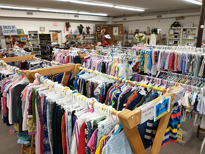 Treasure hunter's paradise! Rows upon rows of color-coded clothing racks create a rainbow roadmap to potential fashion finds and unexpected style upgrades.