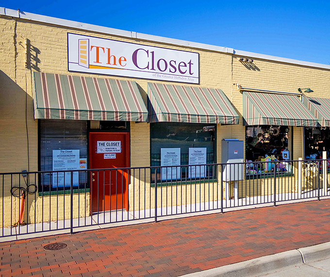 The bright red door and cheerful yellow exterior of The Closet beckons bargain hunters like a lighthouse for the budget-conscious shopper.
