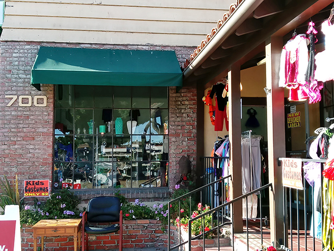 The unassuming brick facade of Alpha Thrift Store on Milpas Street hides a treasure trove within, like finding the secret entrance to Narnia behind an ordinary wardrobe.