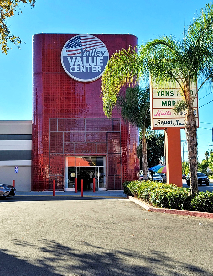 The unmistakable crimson tower of Valley Value Center stands like a beacon for bargain hunters in Van Nuys, promising treasures within its distinctive walls.