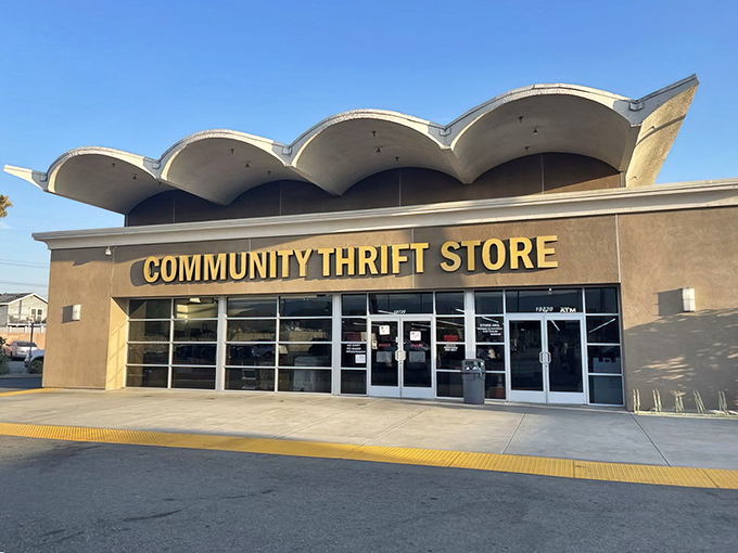 The distinctive wavy roof of Community Thrift Store stands out like a mid-century modern treasure chest waiting to be opened.