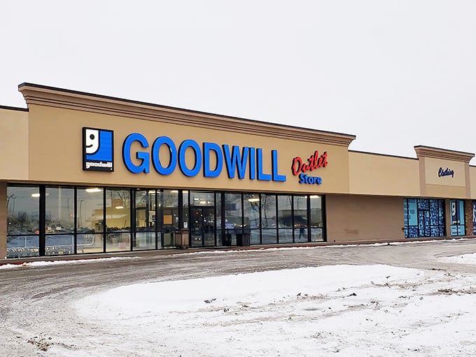 The blue Goodwill sign beckons like a lighthouse for bargain hunters navigating the sea of retail options in Des Moines. Where treasures await discovery without the treasure map price tag.