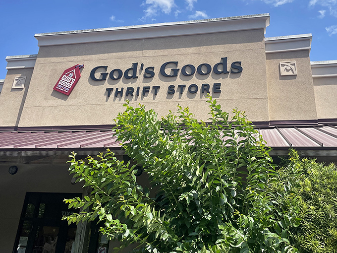 The welcoming facade of God's Goods Thrift Store stands proud under South Carolina's blue skies, promising treasures within its walls