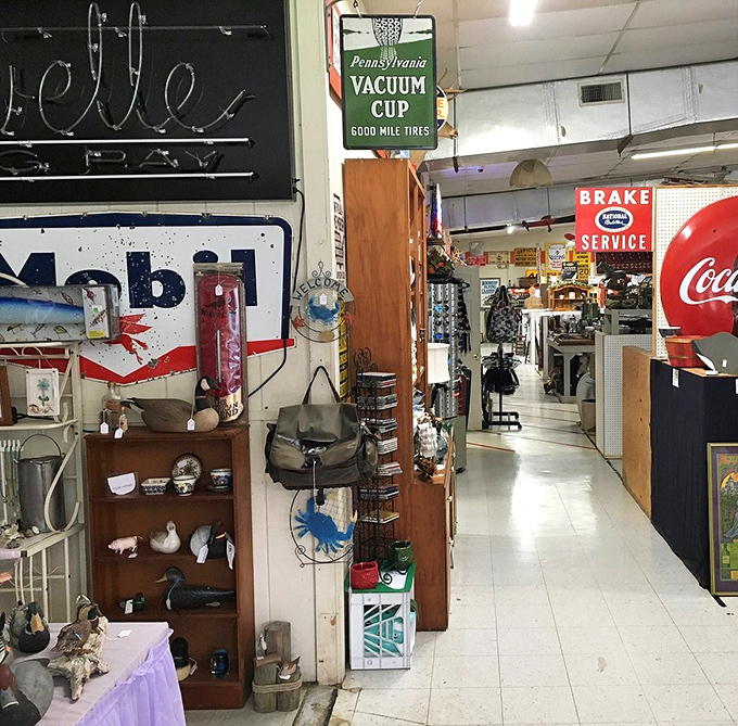 The unassuming exterior hides a wonderland of treasures. Like finding the wardrobe to Narnia, but with vintage signs instead of talking lions.