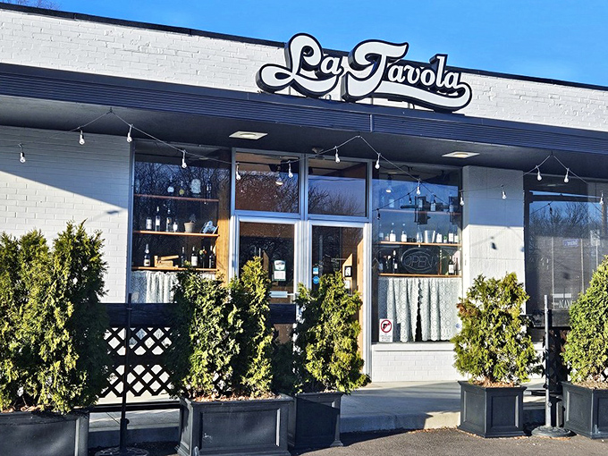 The unassuming white brick fa&ccedil;ade of La Tavola might not scream "culinary destination," but those evergreens are practically waving you in for pasta perfection.