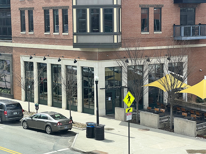 Northstar's wooden facade beckons like an old friend in Columbus' Short North district, where outdoor diners bask in Ohio sunshine and urban energy.