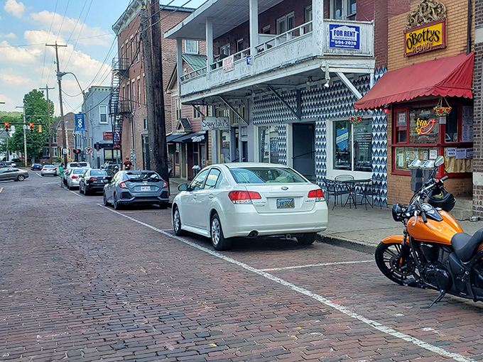 O'Betty's iconic red awning beckons from Athens' charming brick street, where culinary adventures await behind that unassuming storefront.