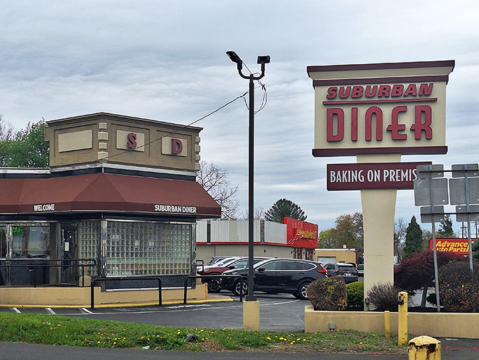 That iconic red signage promising "BAKING ON PREMIS" isn't just advertising &ndash; it's a sacred vow to carb enthusiasts everywhere.