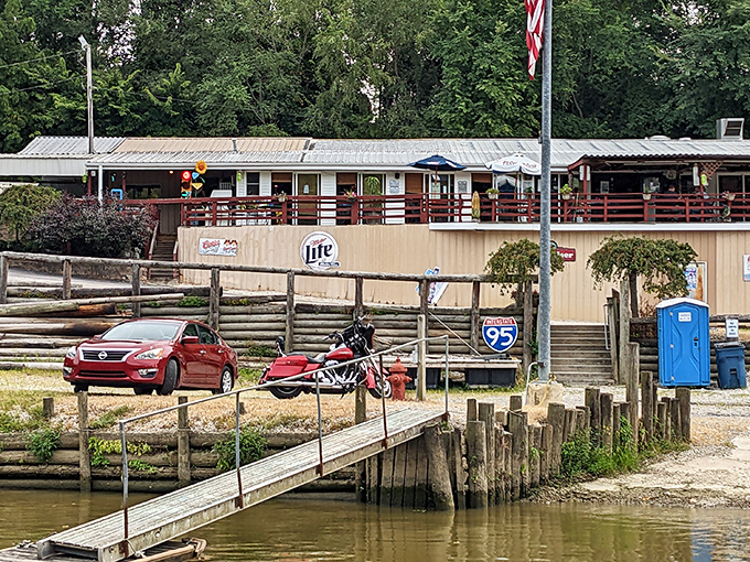 The approach to Tackle Box 2 feels like discovering a secret fishing camp that happens to serve incredible food. That wooden deck practically beckons you inside.