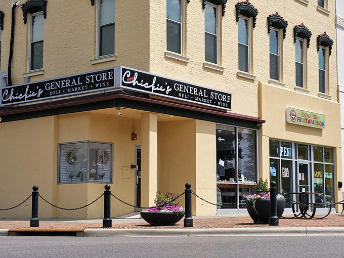 The charming yellow brick exterior of Chickie's General Store stands as a beacon of sandwich salvation on Newark's street, promising delicious discoveries within.