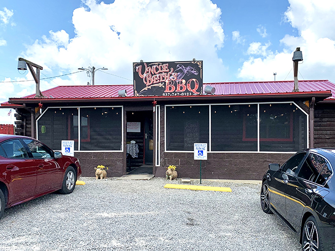 The unassuming exterior of Uncle Beth's BBQ proves once again that the best barbecue joints often hide in plain sight, with that red roof beckoning like a smoky beacon.