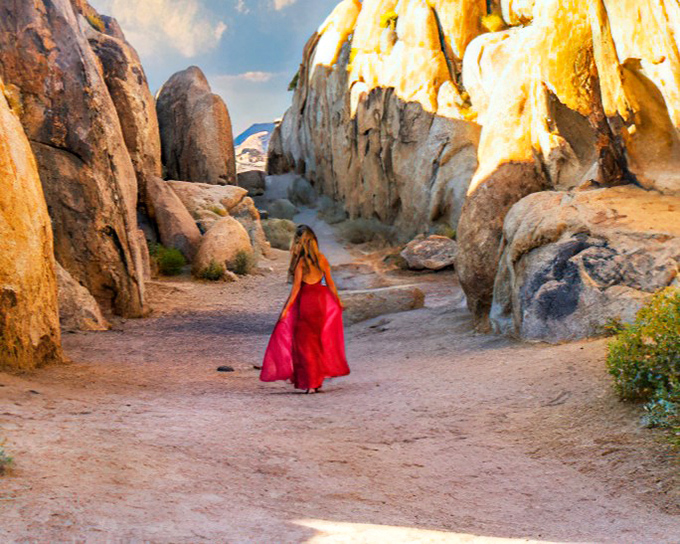 Nature's own sculpture garden where golden rocks create narrow passages that feel like walking through an artist's imagination.