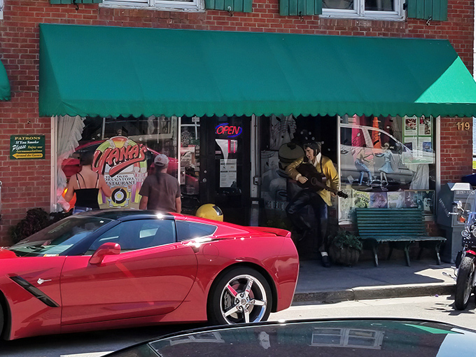 The unassuming green awning of Yanas Restaurant hides a time-traveling culinary experience. That red Corvette knows what's up.