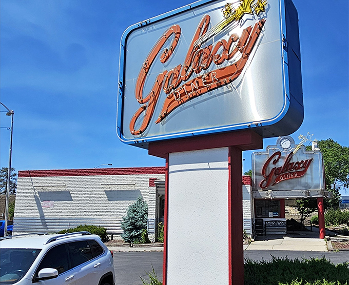 The neon glow of Galaxy Diner's sign against the Flagstaff sky isn't just illumination&mdash;it's a beacon calling hungry travelers home to Route 66 nostalgia.