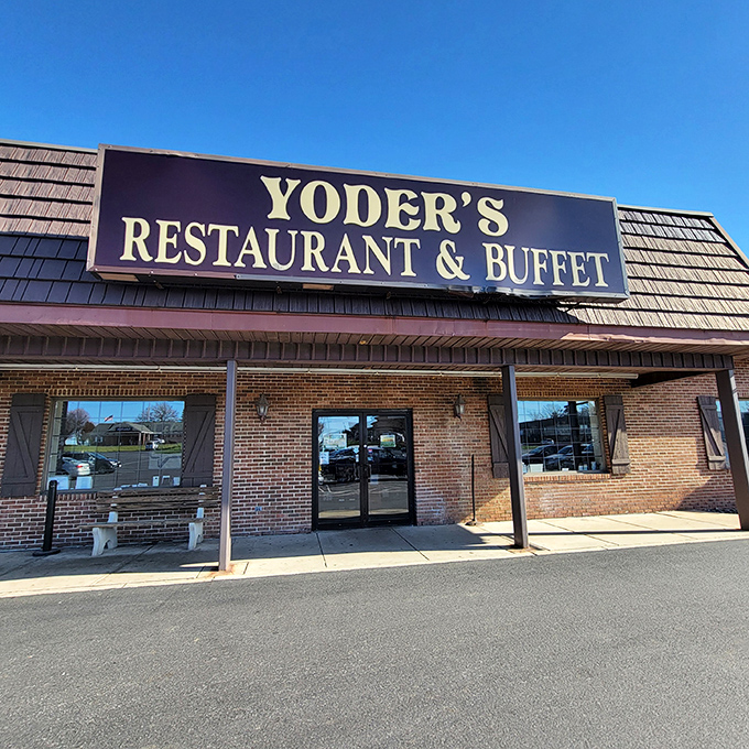 The brick exterior of Yoder's welcomes hungry travelers with its wooden shutters and simple signage &ndash; like a warm handshake before the culinary embrace inside.