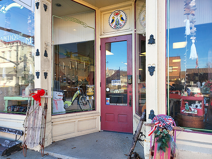 The welcoming burgundy door and classic storefront beckon like an old friend saying, "Come in, I've been saving something special just for you."