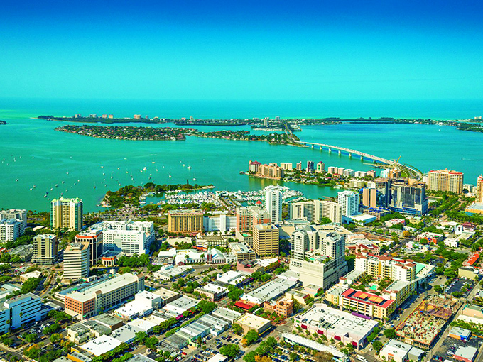 Sarasota's waterways weave through upscale neighborhoods like blue ribbons on a gift you can't wait to unwrap. Paradise with boat parking!