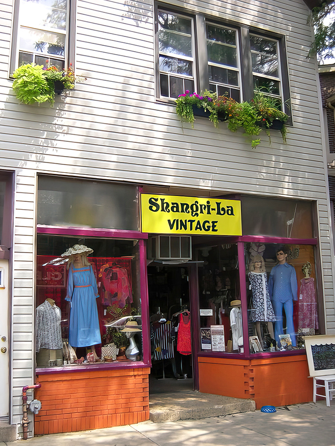 The cheerful yellow sign and vibrant window displays of Shangri-La Vintage beckon fashion explorers like a retro lighthouse in Roscoe Village's sea of modern retail.
