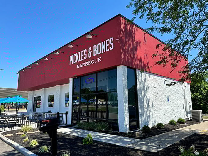 Sunshine bathes the striking red building, where barbecue dreams come true. No fancy frills needed when what's inside matters most.