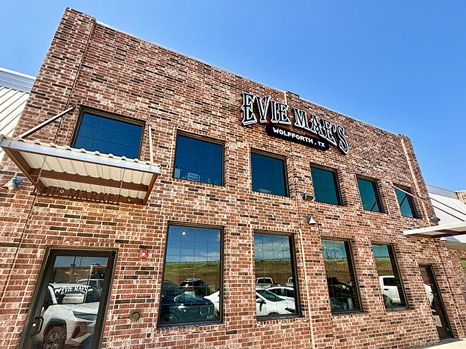 The brick fortress of flavor stands proudly against the Texas sky, a temple where smoke signals announce "come and get it" to barbecue pilgrims.