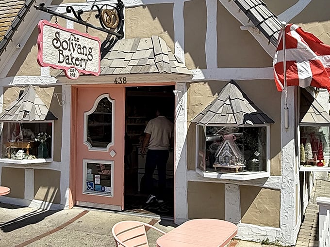 The storybook façade of Solvang Bakery, complete with that iconic pink door, looks like it was plucked straight from a Danish fairy tale and planted in California.