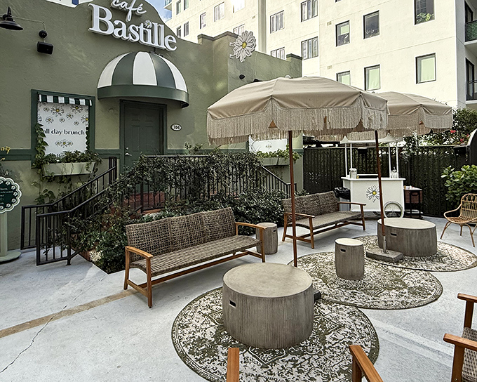 Caf&eacute; Bastille's charming exterior welcomes you with Parisian flair and fringe-adorned umbrellas&mdash;like a French postcard come to life in Fort Lauderdale.