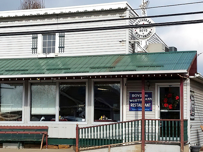 The unassuming storefront of Boyd & Wurthmann beckons like an old friend, promising comfort food treasures behind its modest green-trimmed exterior.