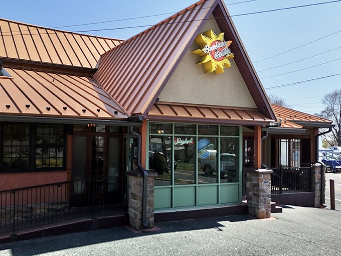 The copper-topped roof and sunny logo beckon like an old friend waving you in for comfort food that'll make your soul smile.