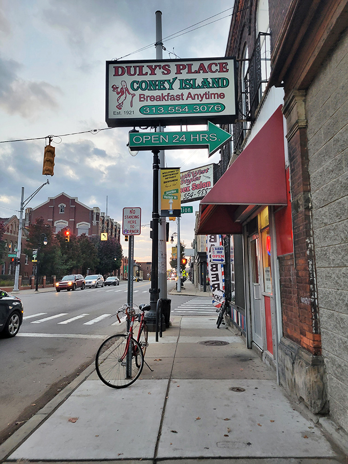 The iconic Duly's Place sign stands sentinel on Junction Street, promising "Breakfast Anytime" with the confidence of someone who's been keeping that promise since 1921.