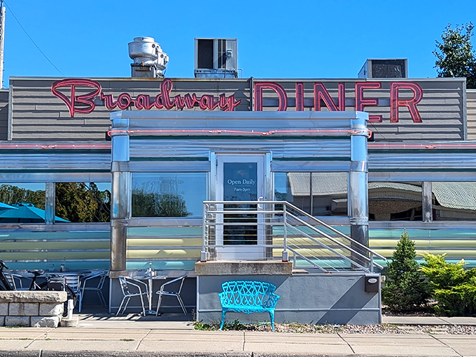 The gleaming stainless steel exterior of Broadway Diner shines like a beacon of hope for hungry travelers. This classic roadside architecture promises delicious comfort inside.