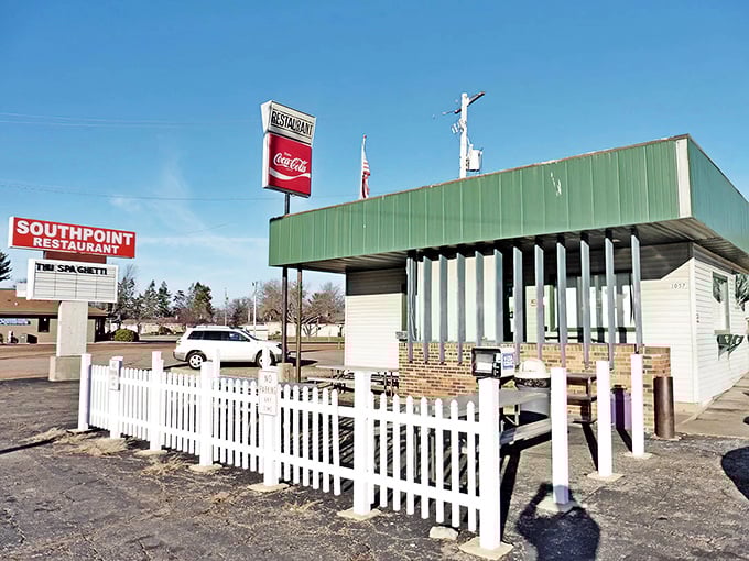 That iconic red sign promises what every Wisconsin road trip needs&mdash;a genuine diner experience where calories don't count.