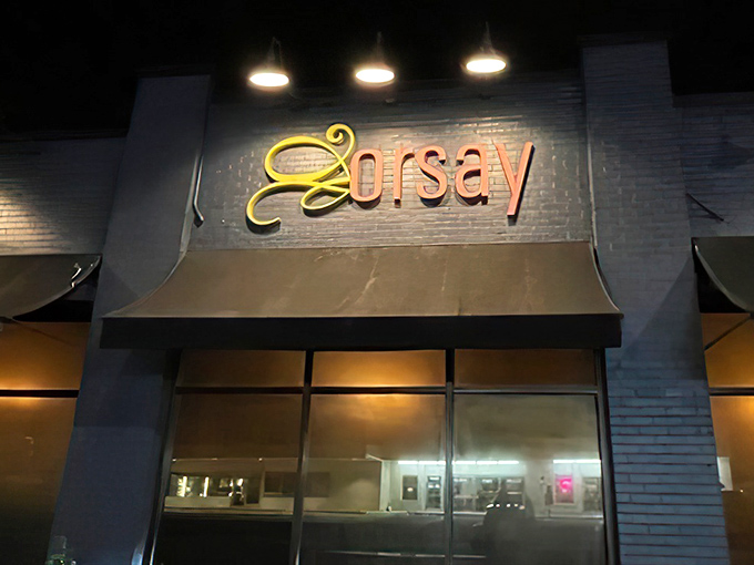 The elegant glow of Orsay's exterior sign welcomes you like a French bistro that somehow found its way to Jacksonville's charming Avondale neighborhood.