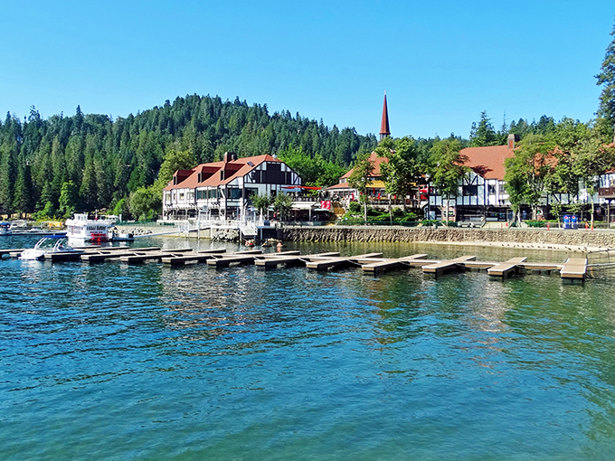 The quintessential Lake Arrowhead view&mdash;Tudor-style buildings nestled against emerald pines with that impossibly blue water. Mother Nature showing off again.