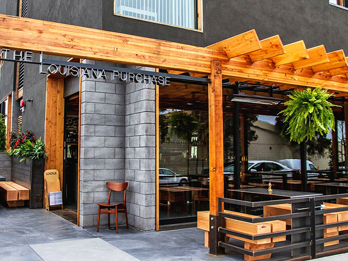 The wooden pergola and lush hanging plants at Louisiana Purchase's entrance might make you forget you're in San Diego and not a French Quarter courtyard.