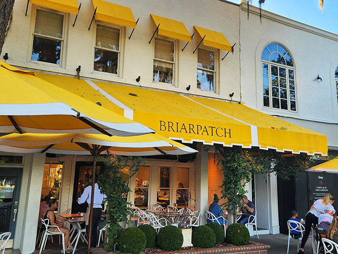 The sunshine-yellow awning of Briarpatch isn't just a color choice&mdash;it's a promise of the bright flavors waiting inside this Winter Park gem.