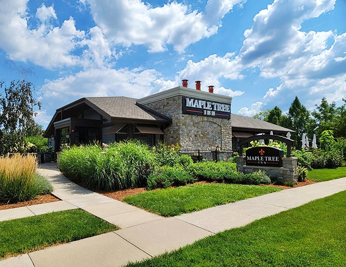 Lush landscaping frames this suburban culinary oasis, where ornamental grasses sway like they're dancing to zydeco music.